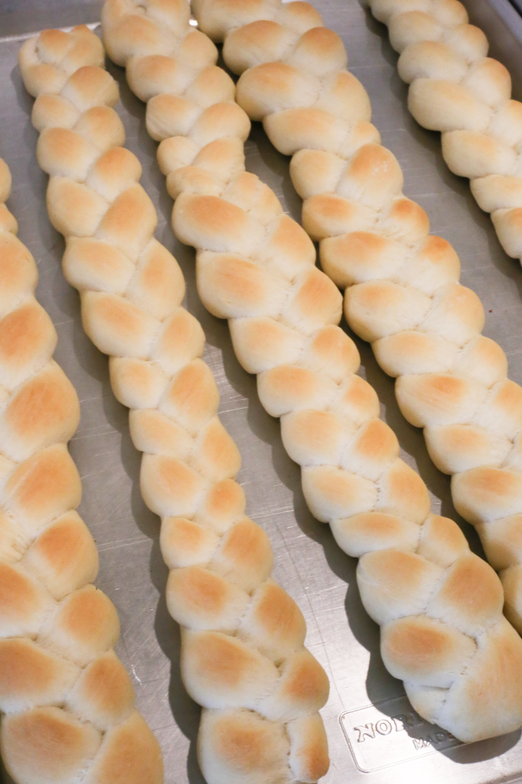 Mouth-Watering Braided Garlic Breadstick Recipe - The Unlikely Hostess